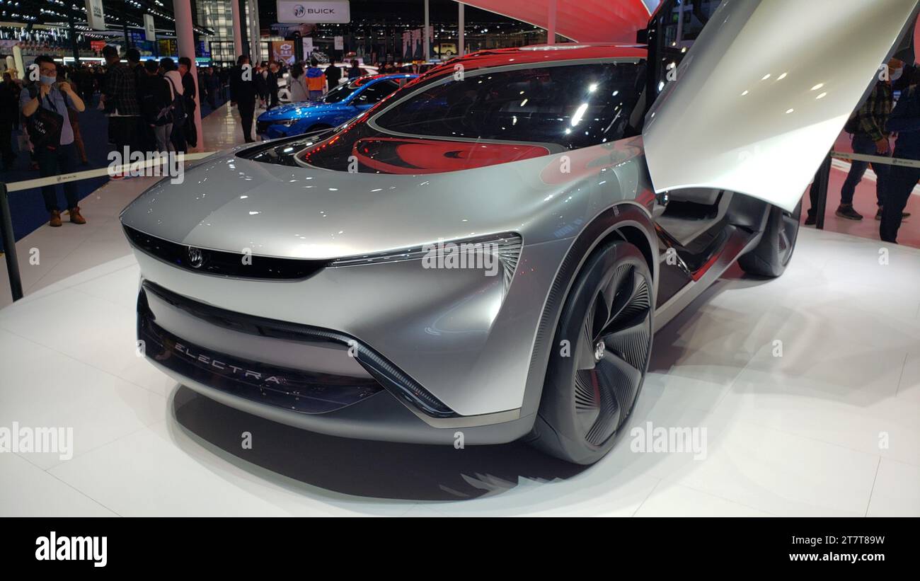 A modern gray car on display in a showroom Stock Photo - Alamy