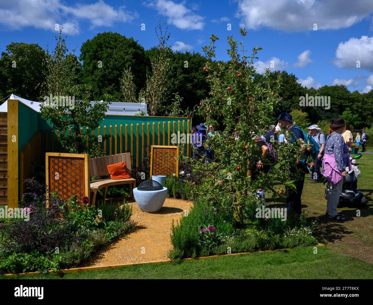 The Empowerment Garden competition entry (flowers, fruit trees, herbs, edibles, gravel path ...