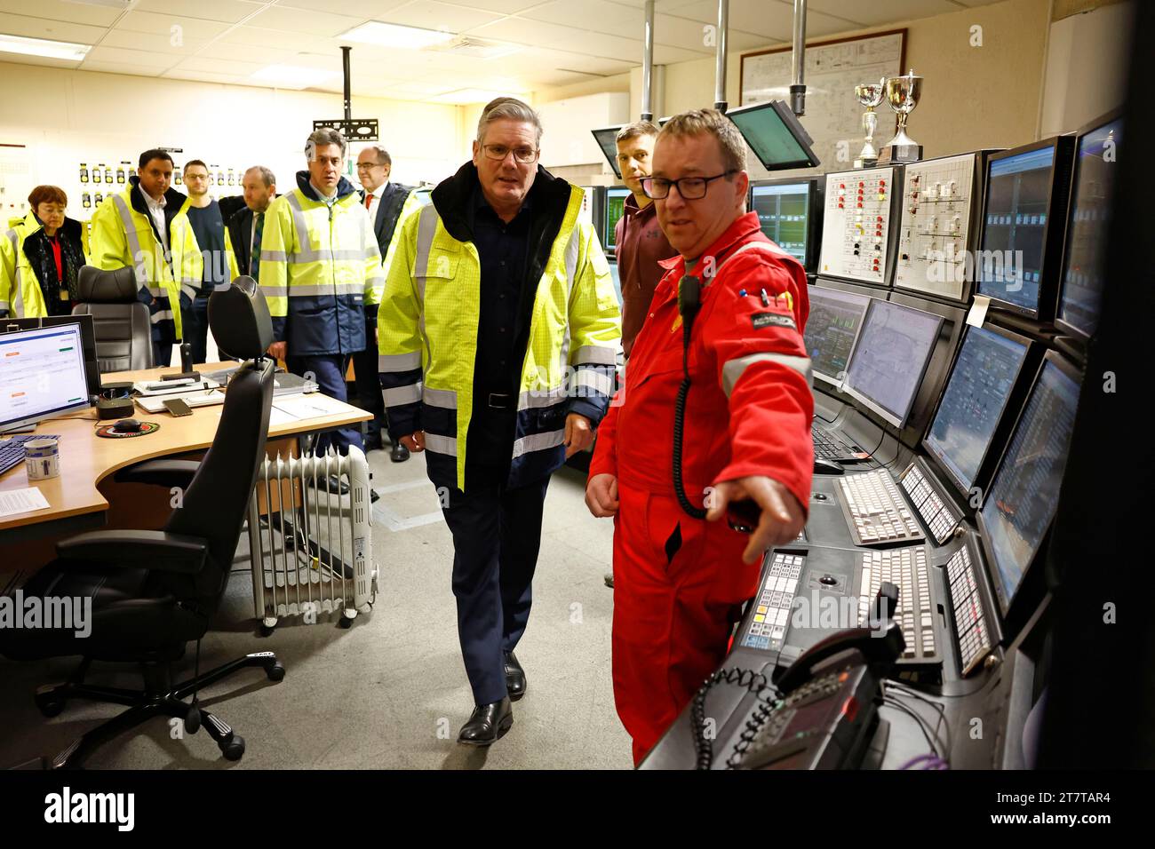 Labour leader Sir Keir Starmer (centre) takes a tour of the control ...