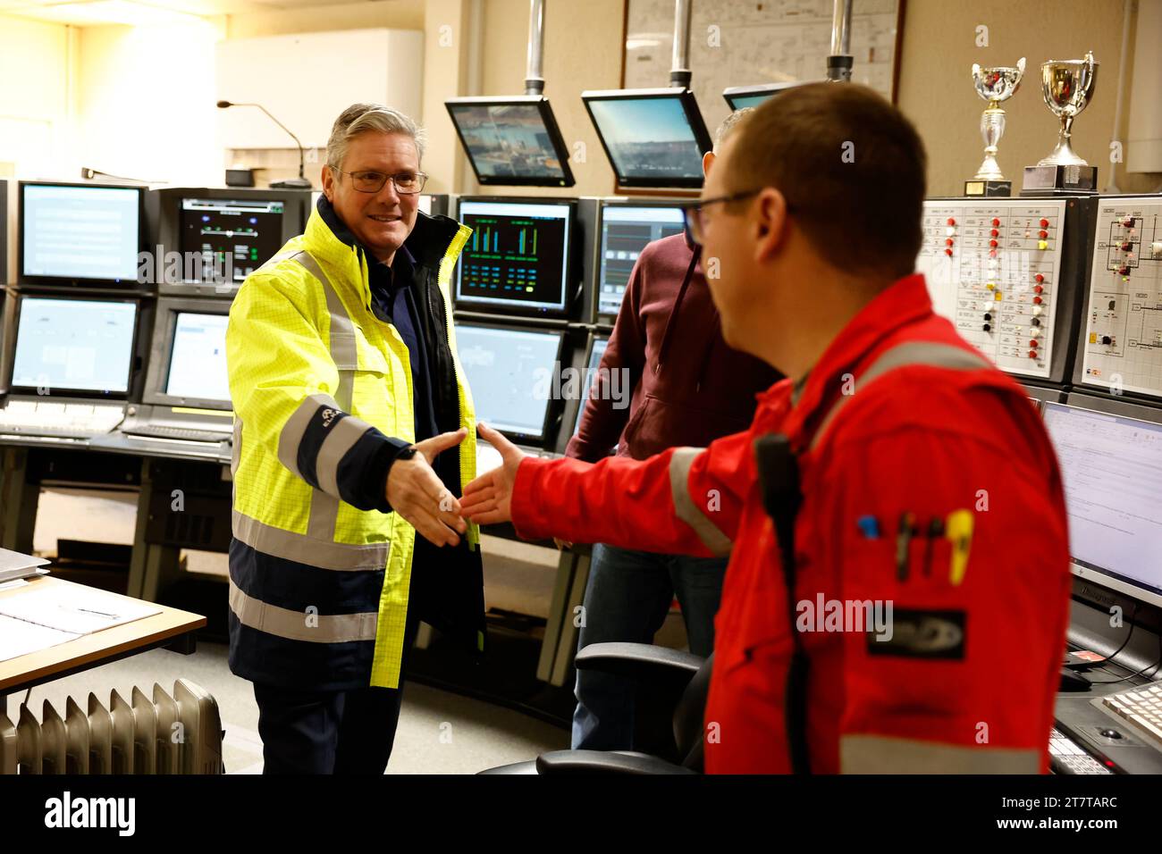 Labour leader Sir Keir Starmer (left) takes a tour of the control room ...