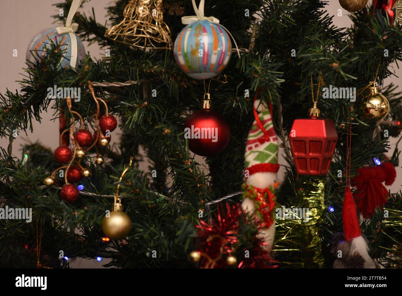 Yuletide Glow: Festive Christmas Tree Decorations Stock Photo - Alamy