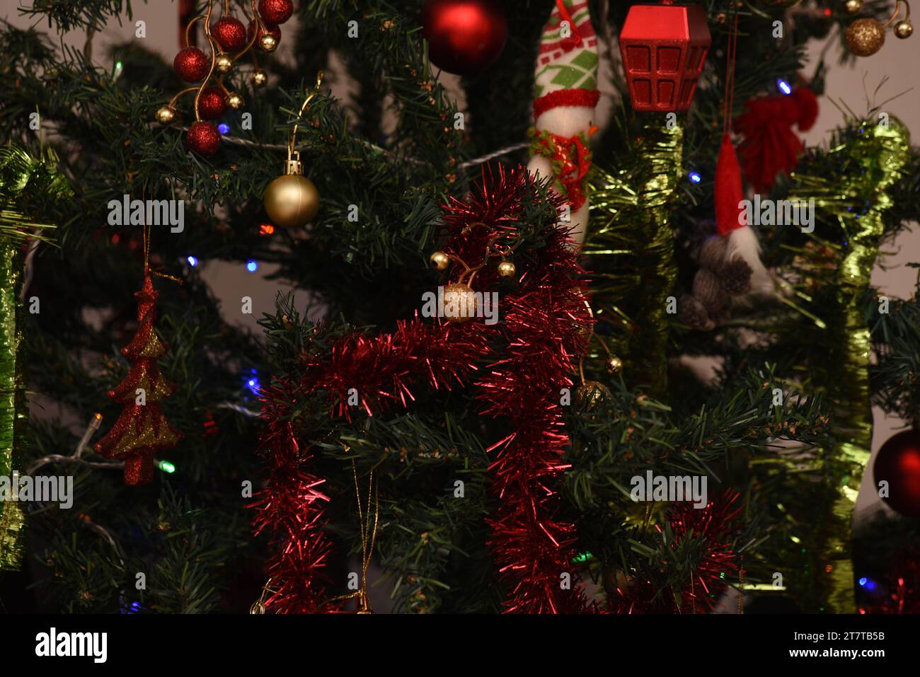 Yuletide Glow: Festive Christmas Tree Decorations Stock Photo - Alamy