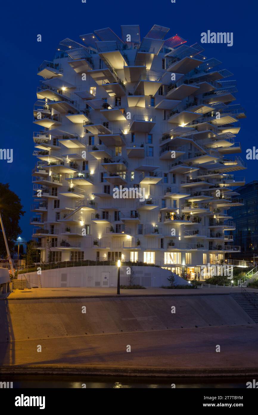 "L'Arbre Blanc" building by night, architects: Sou Fujimoto, Nicolas Laisné, Manal Rachdi ...
