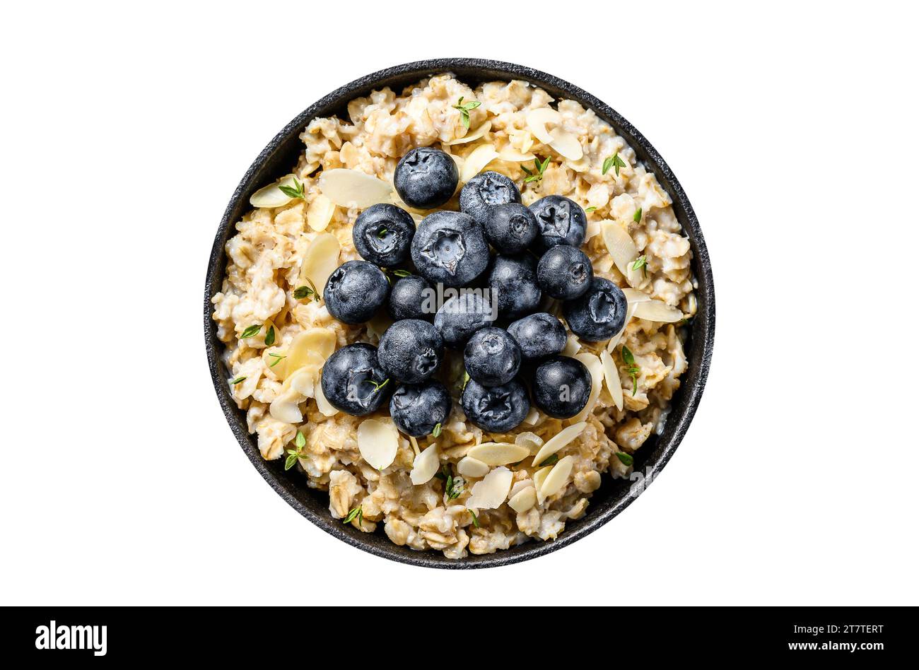 Porridge blueberries almonds Cut Out Stock Images & Pictures - Alamy