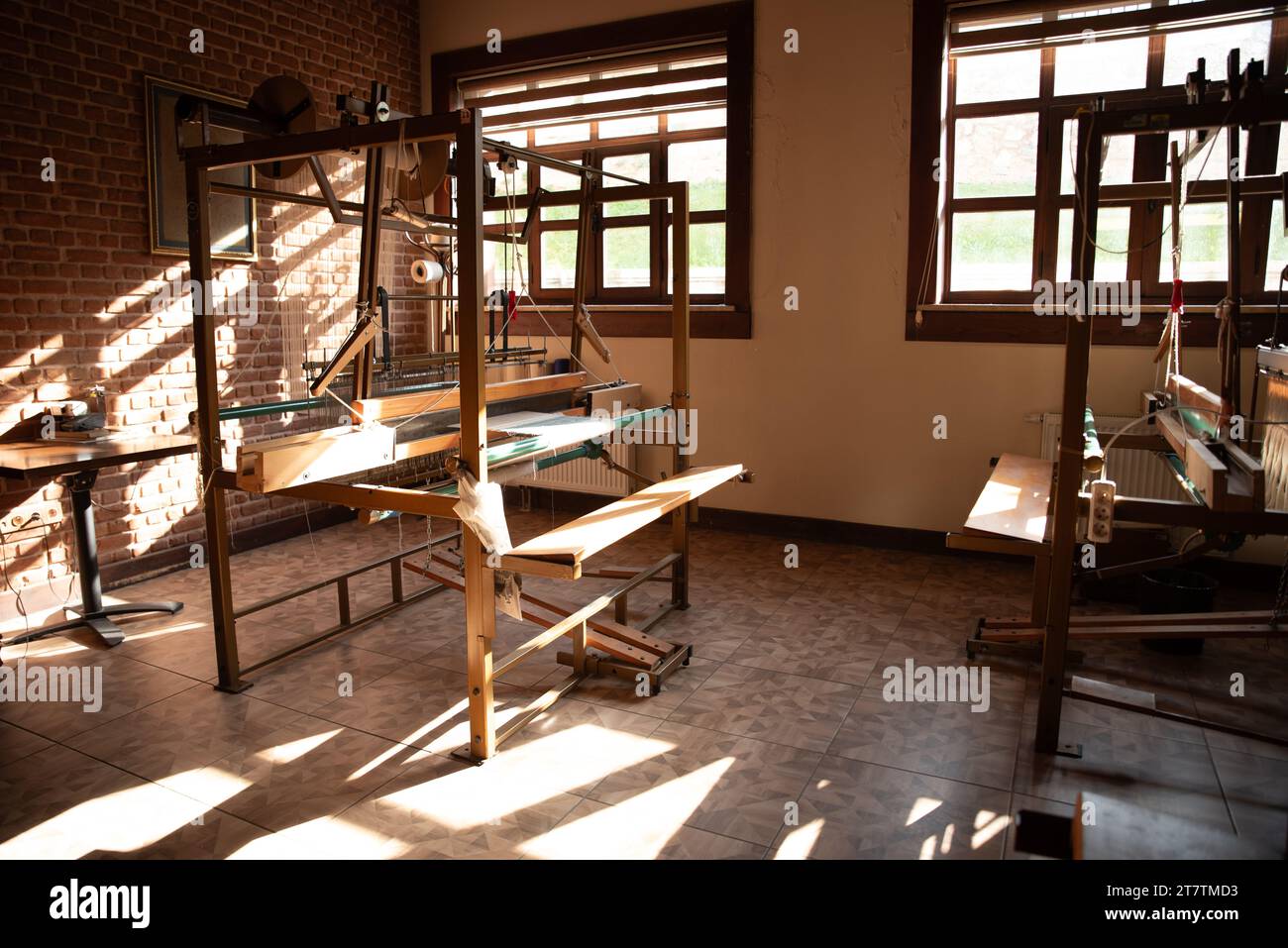 Traditional textile manufacture Weaving thread for the textile industry ...