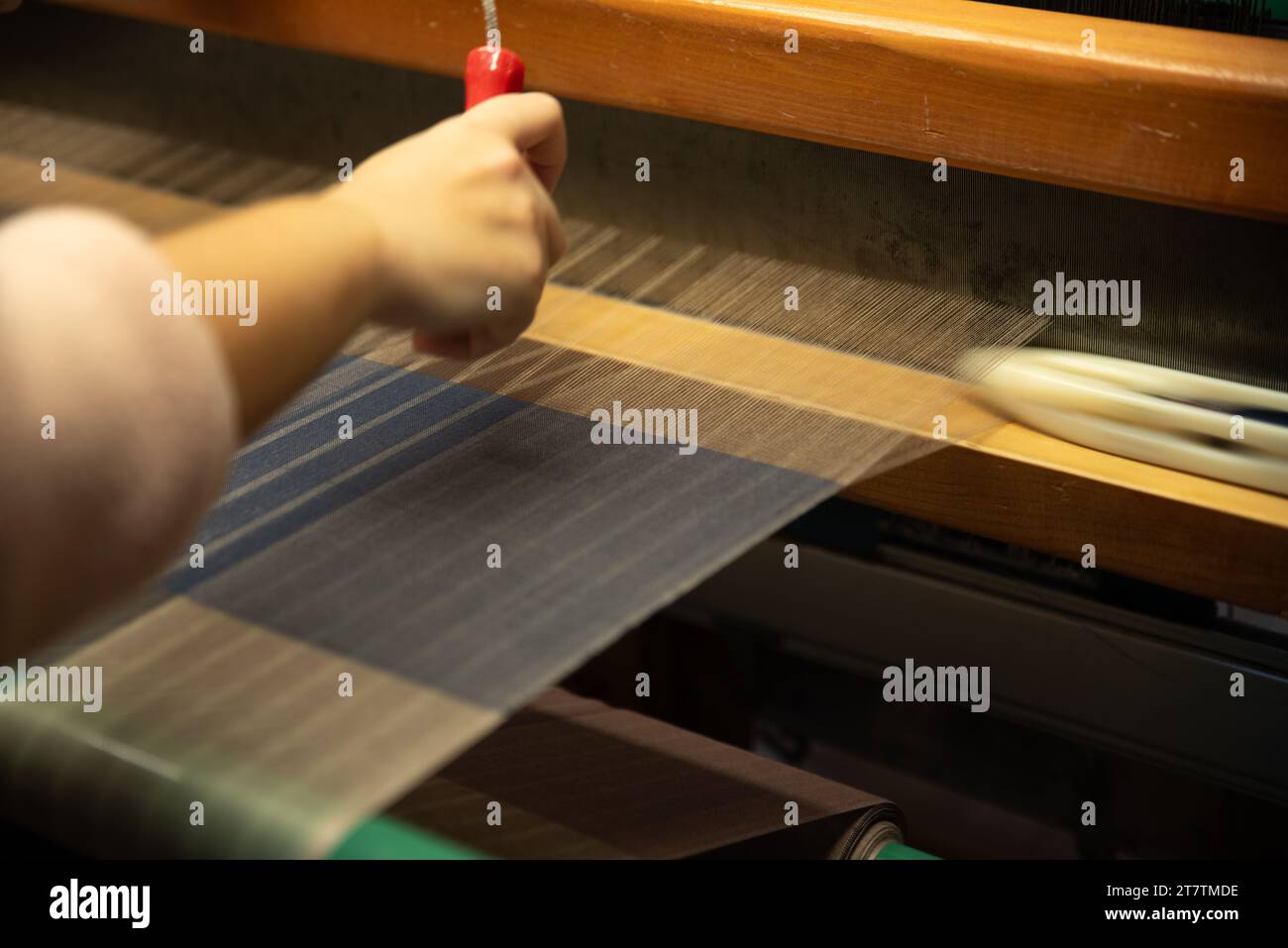 Traditional textile manufacture Weaving thread for the textile industry ...