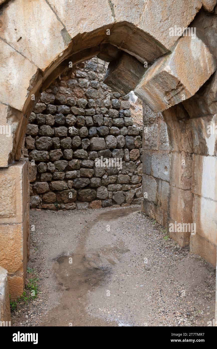 Stone arches and passageway through the interior of the ancient ...