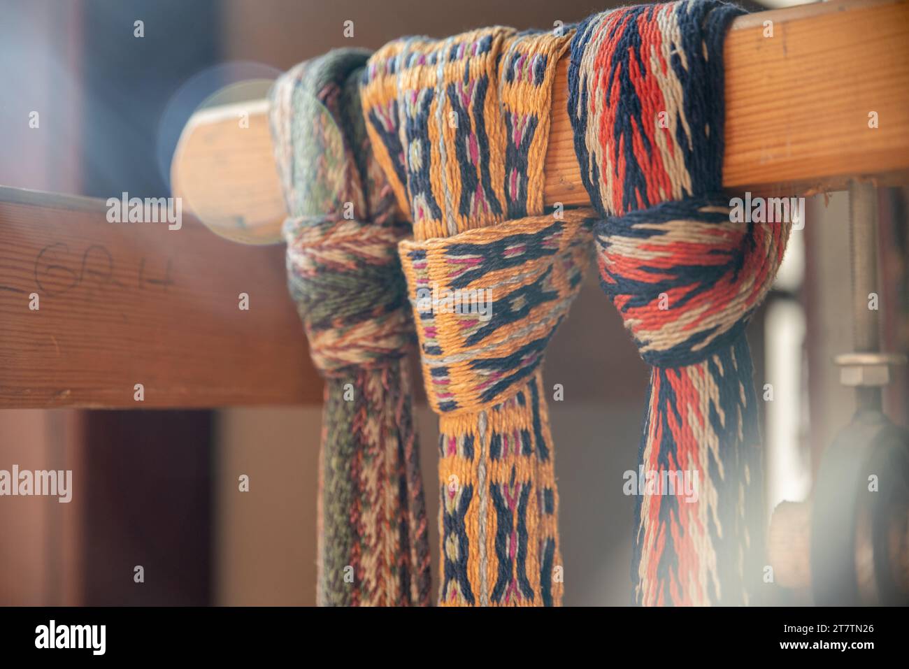 Many colorful belts with patterns. Folk art, handmade, Knitting of a ...