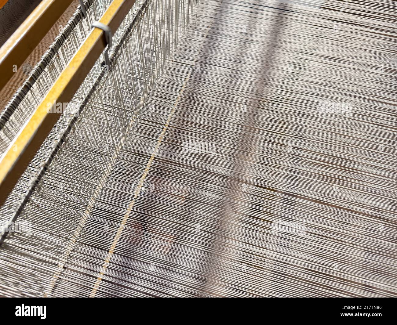 Traditional textile manufacture Weaving thread for the textile industry ...