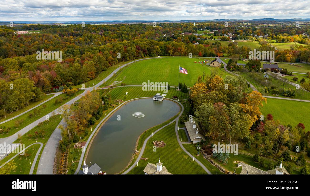 An Aerial View of Fall Countryside of Sun and Color with a Pond and ...