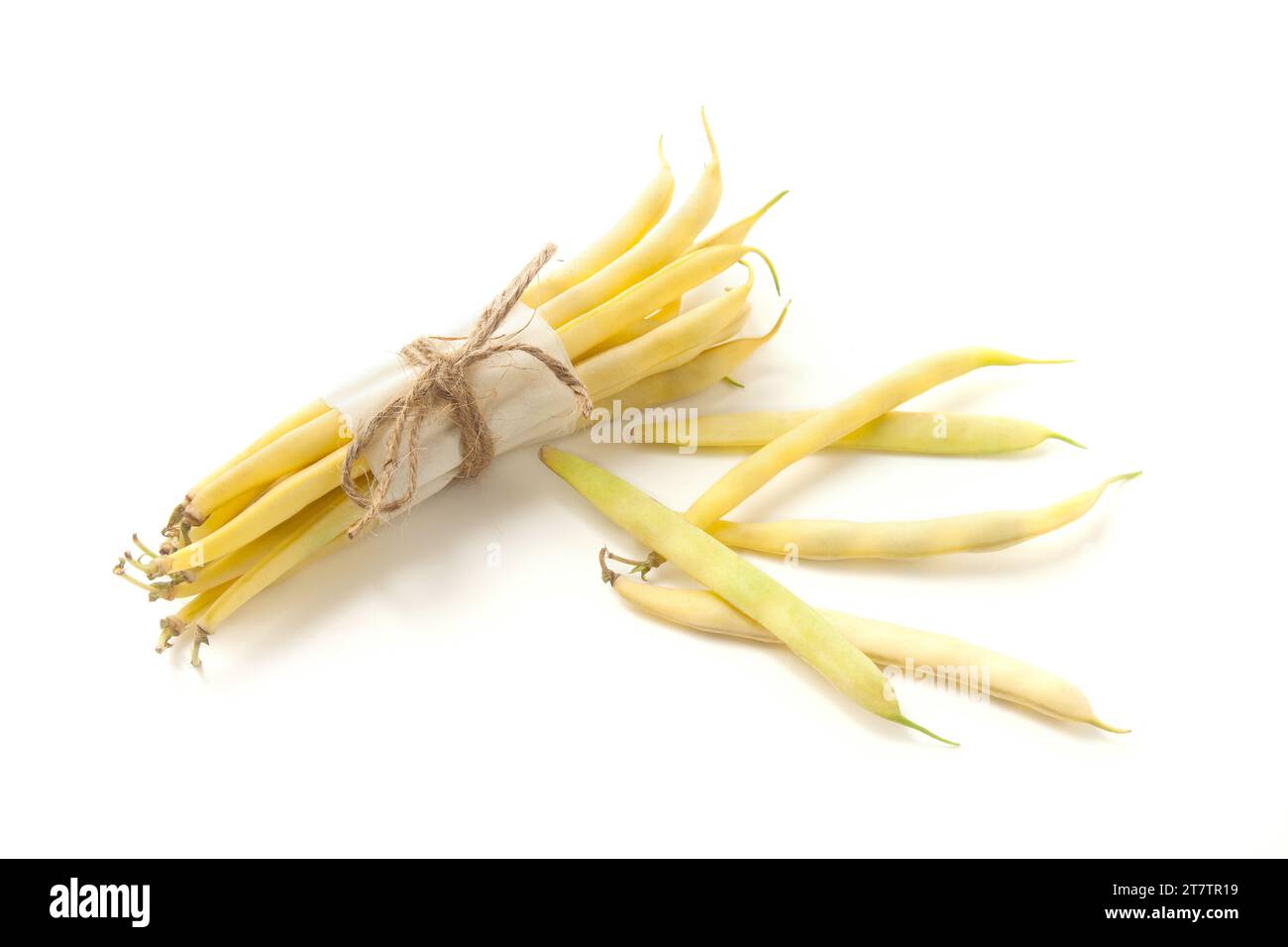 Bunch of raw yellow pods of haricot and several pods isolated on white ...