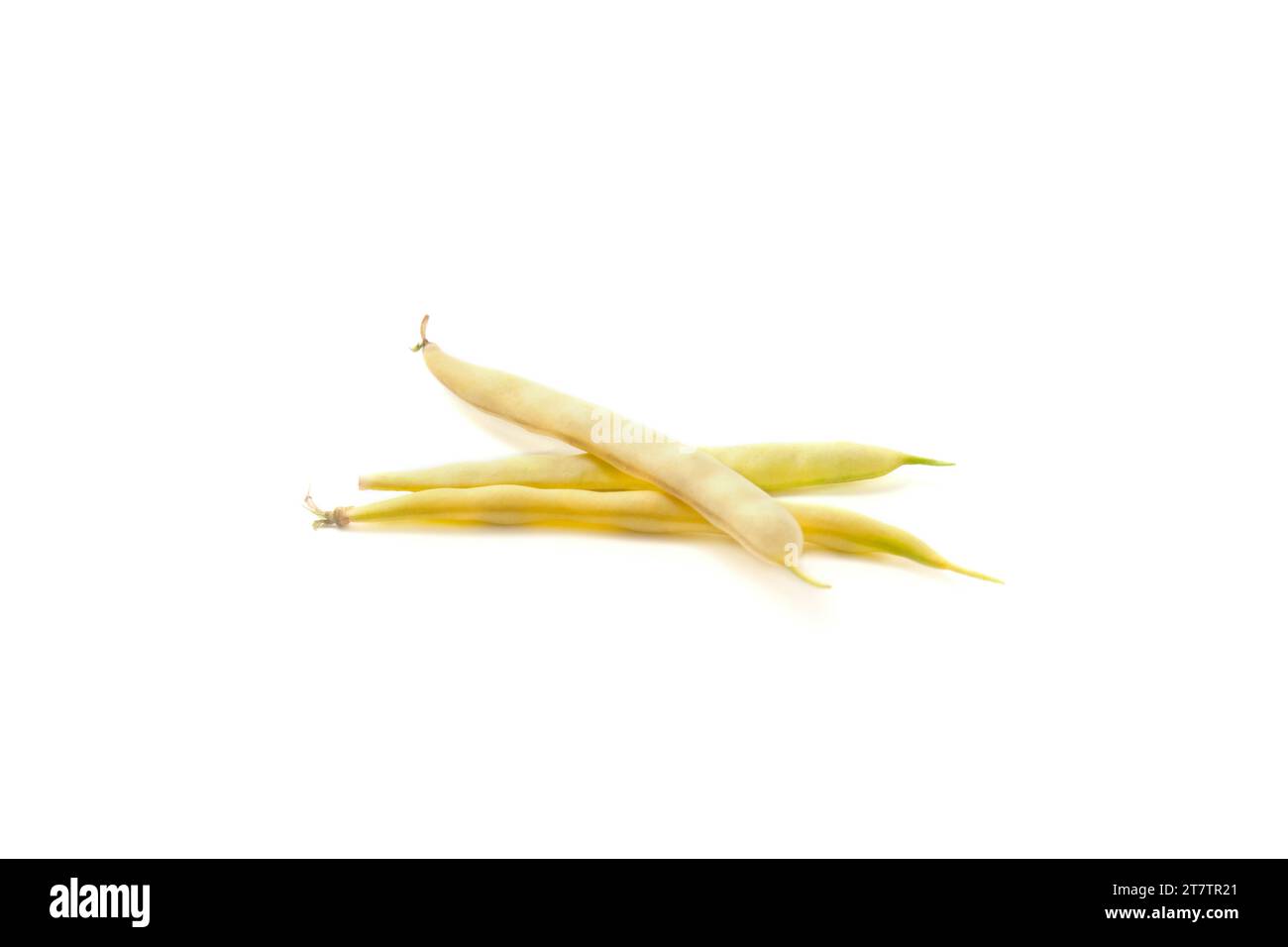 Several pods of raw yellow pods of haricot isolated on white background ...