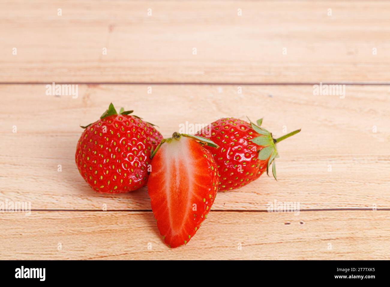Strawberry isolated. Whole, half, cut strawberry on white. Side view ...