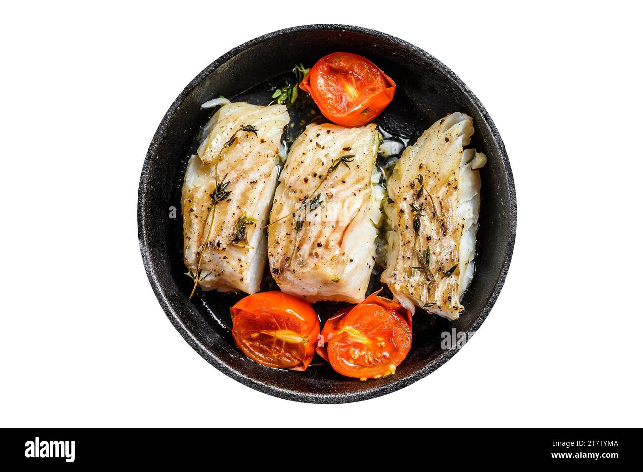 Fried cod fish fillet with spice in a cast iron pan. Isolated, white ...