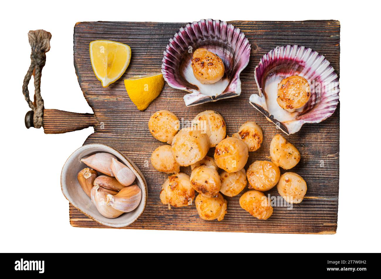 Seared Scallops fillets on a wooden board ready for eat. Isolated ...