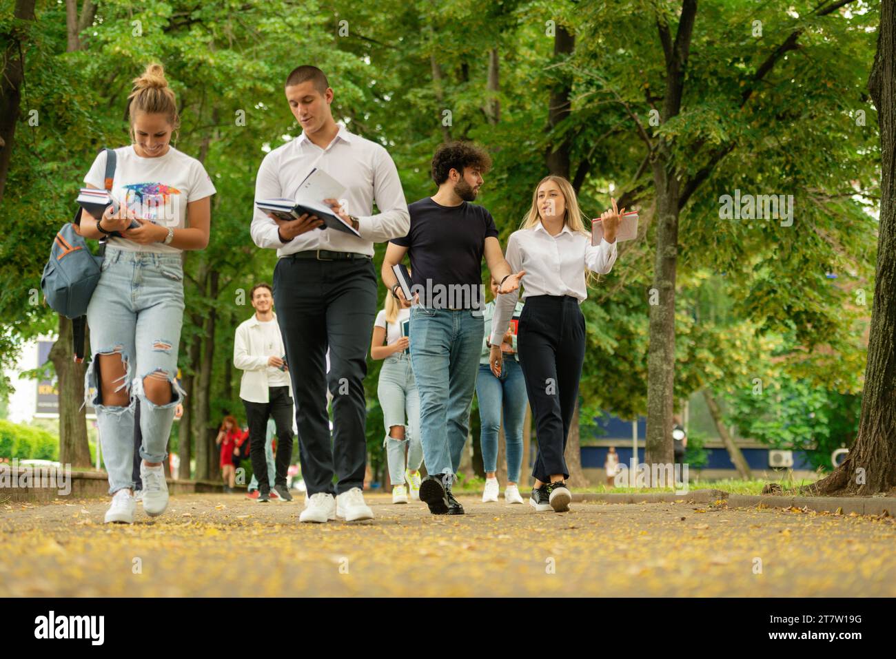 Big group of young students going back to school Stock Photo - Alamy