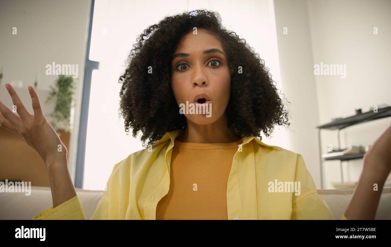 Point of view POV from computer webcam angry annoyed African American ...