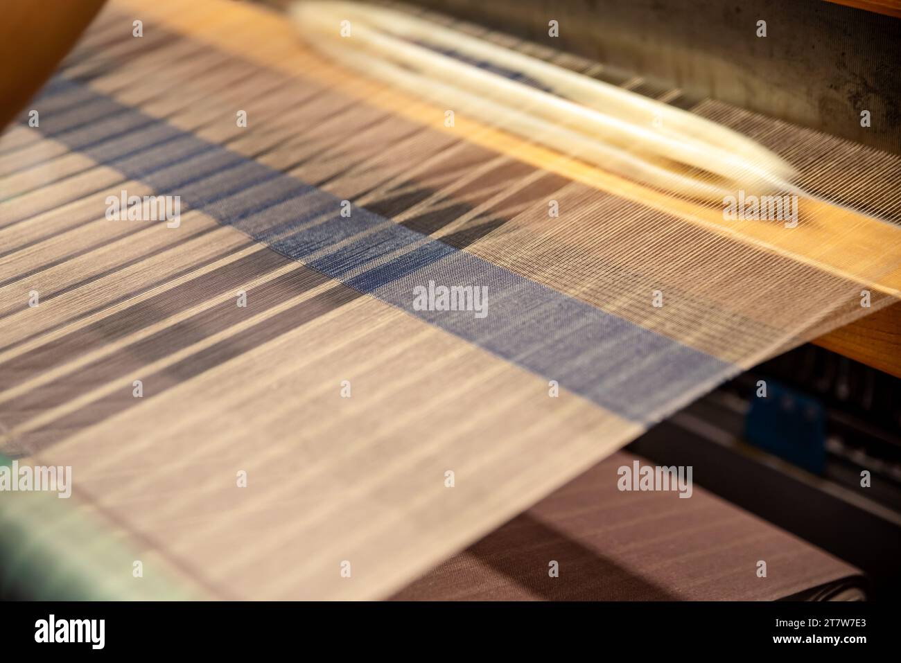 Traditional textile manufacture Weaving thread for the textile industry ...