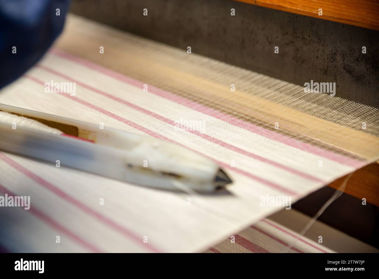 Traditional textile manufacture Weaving thread for the textile industry ...