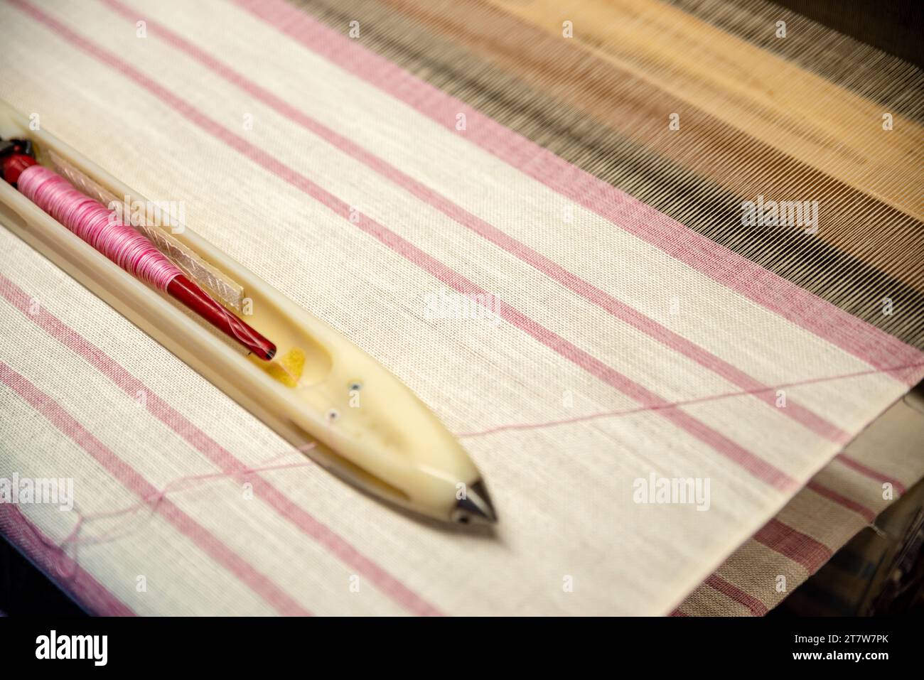 Traditional textile manufacture Weaving thread for the textile industry ...