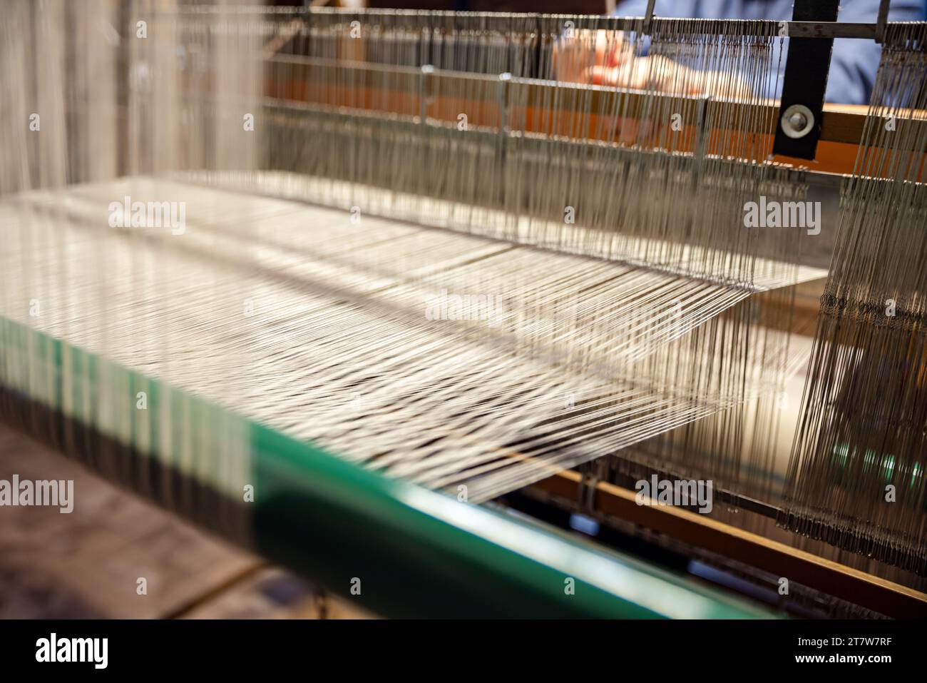 Traditional textile manufacture Weaving thread for the textile industry ...