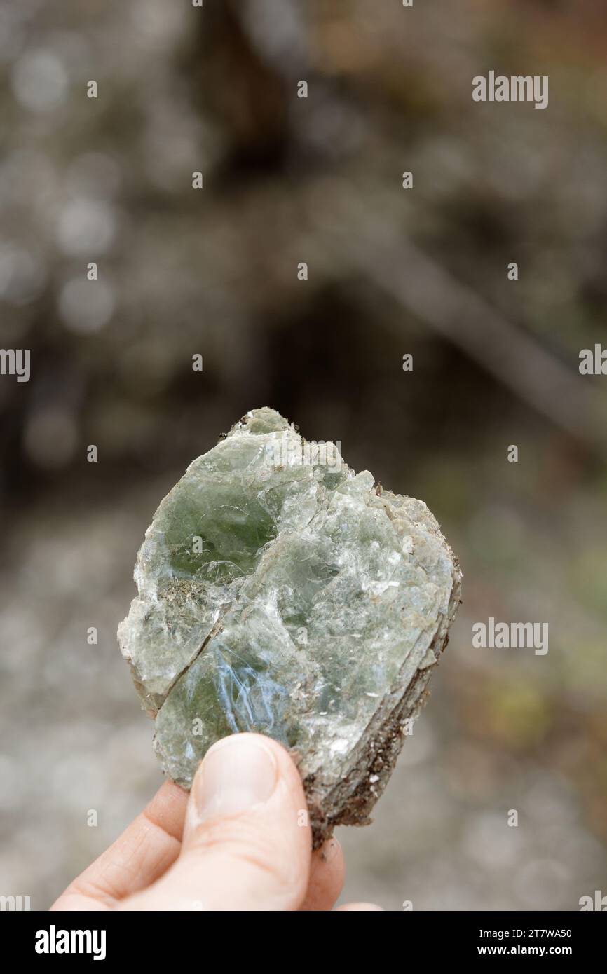 Macro photography of natural unprocessed pieces of mica minerals in a ...