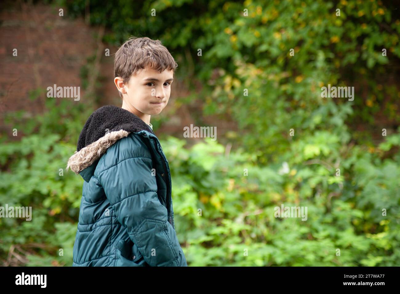 A young boy in early teens, navigating the challenges of autism ...