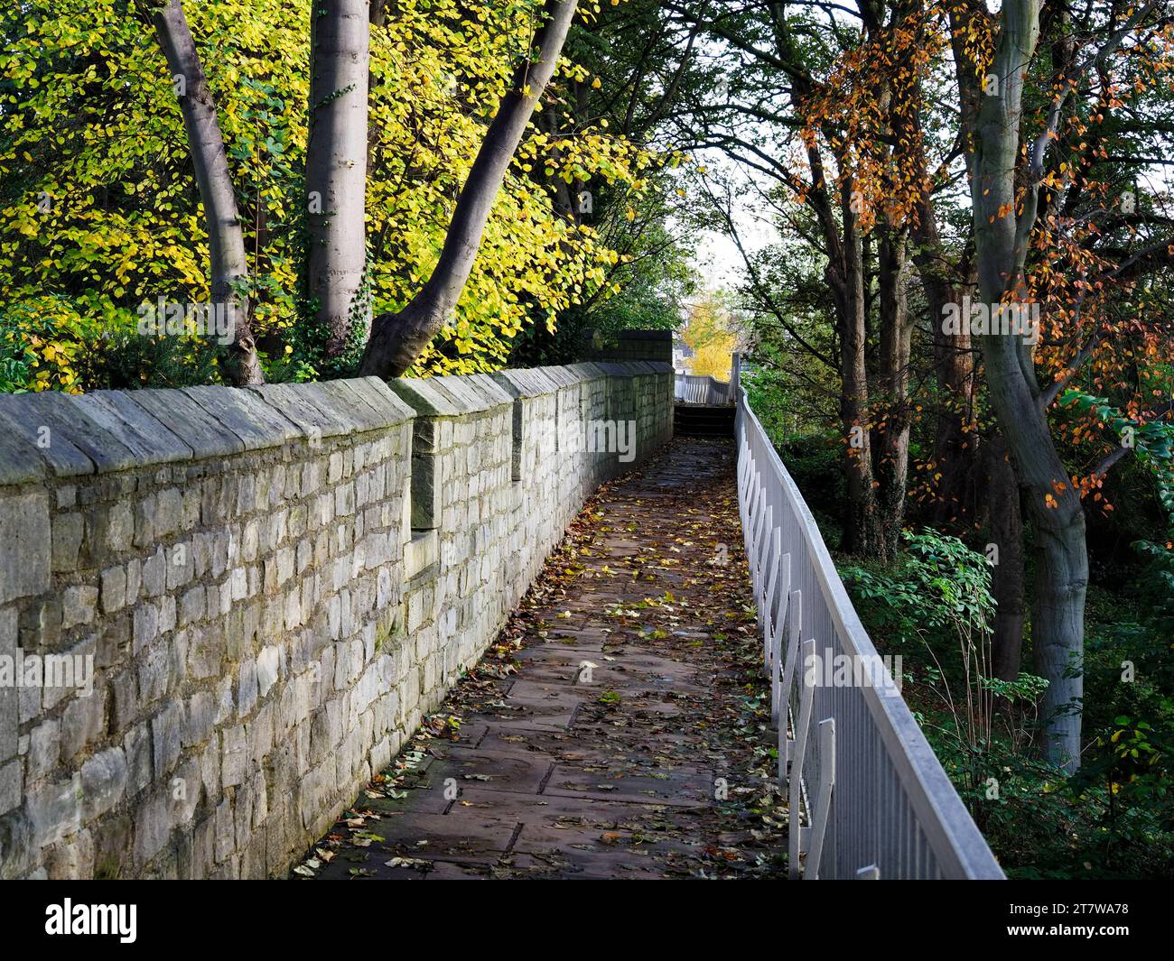 York City Wall between Bootham Bar and Robin Hoods Tower in autumn City ...