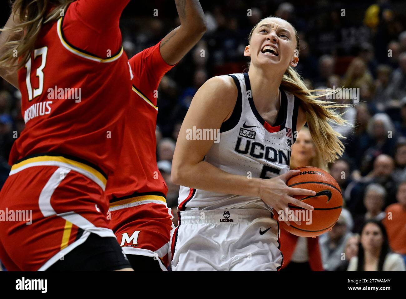 UConn guard Paige Bueckers (5) drives to the basket in the first half ...