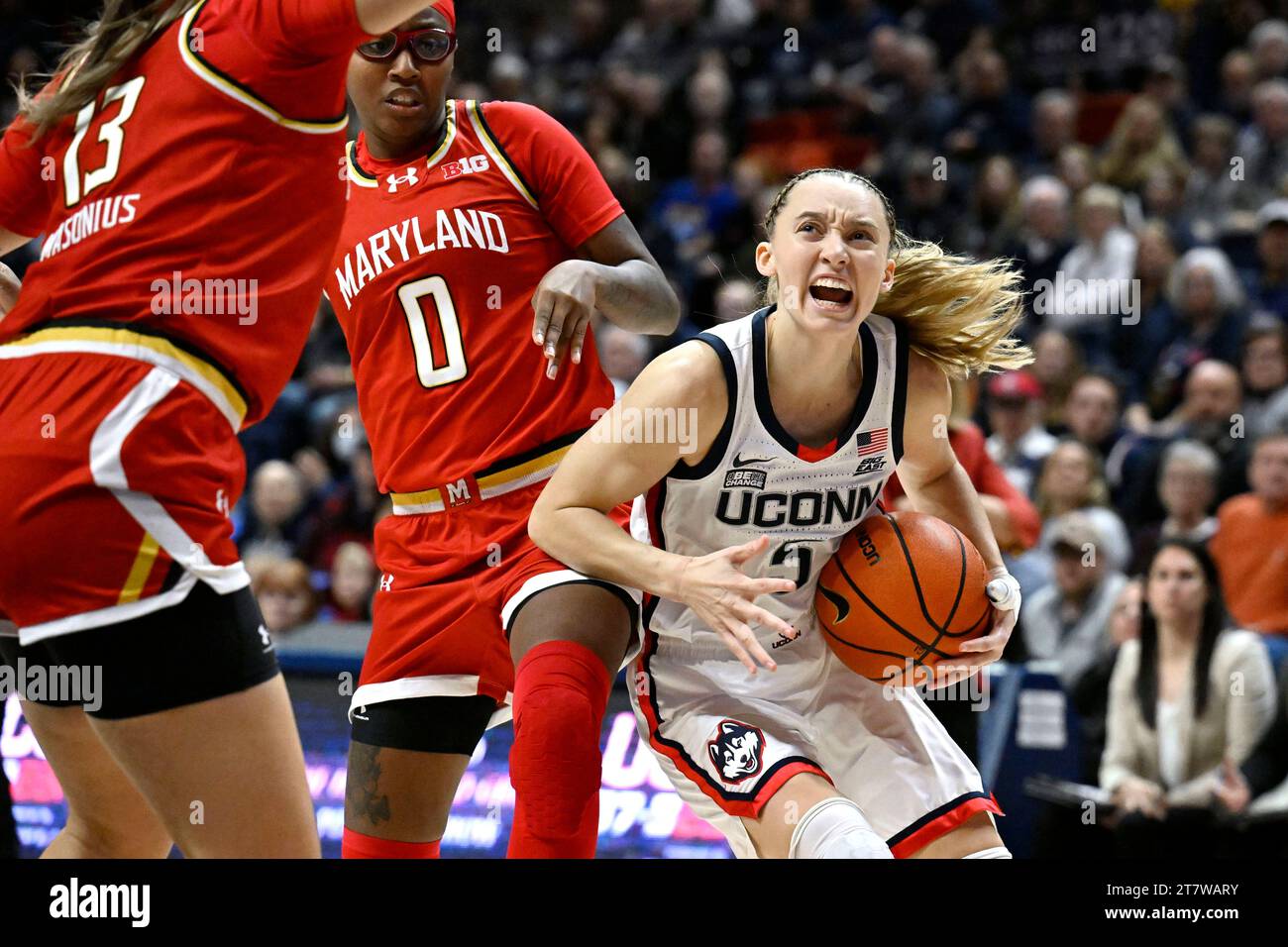 UConn guard Paige Bueckers (5) drives to the basket in the first half ...