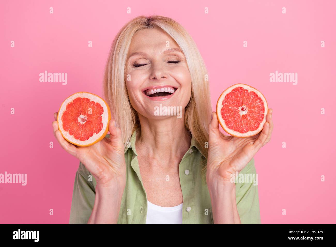 Photo of positive overjoyed grandmother closed eyes toothy smile ...