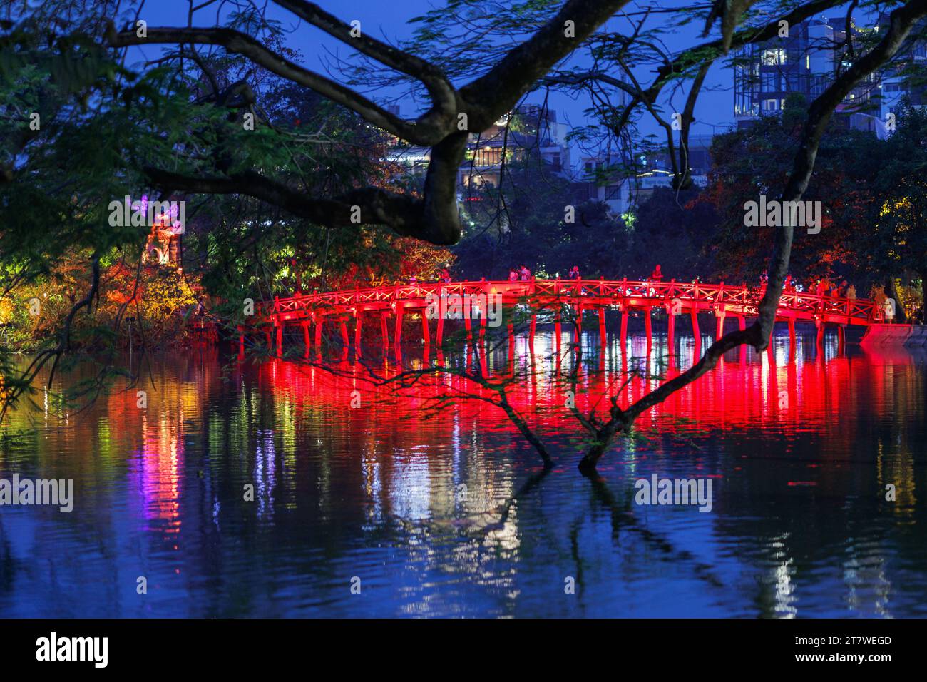 The Huc Bridge illuminated at night in Hanoi, Vietnam Stock Photo - Alamy