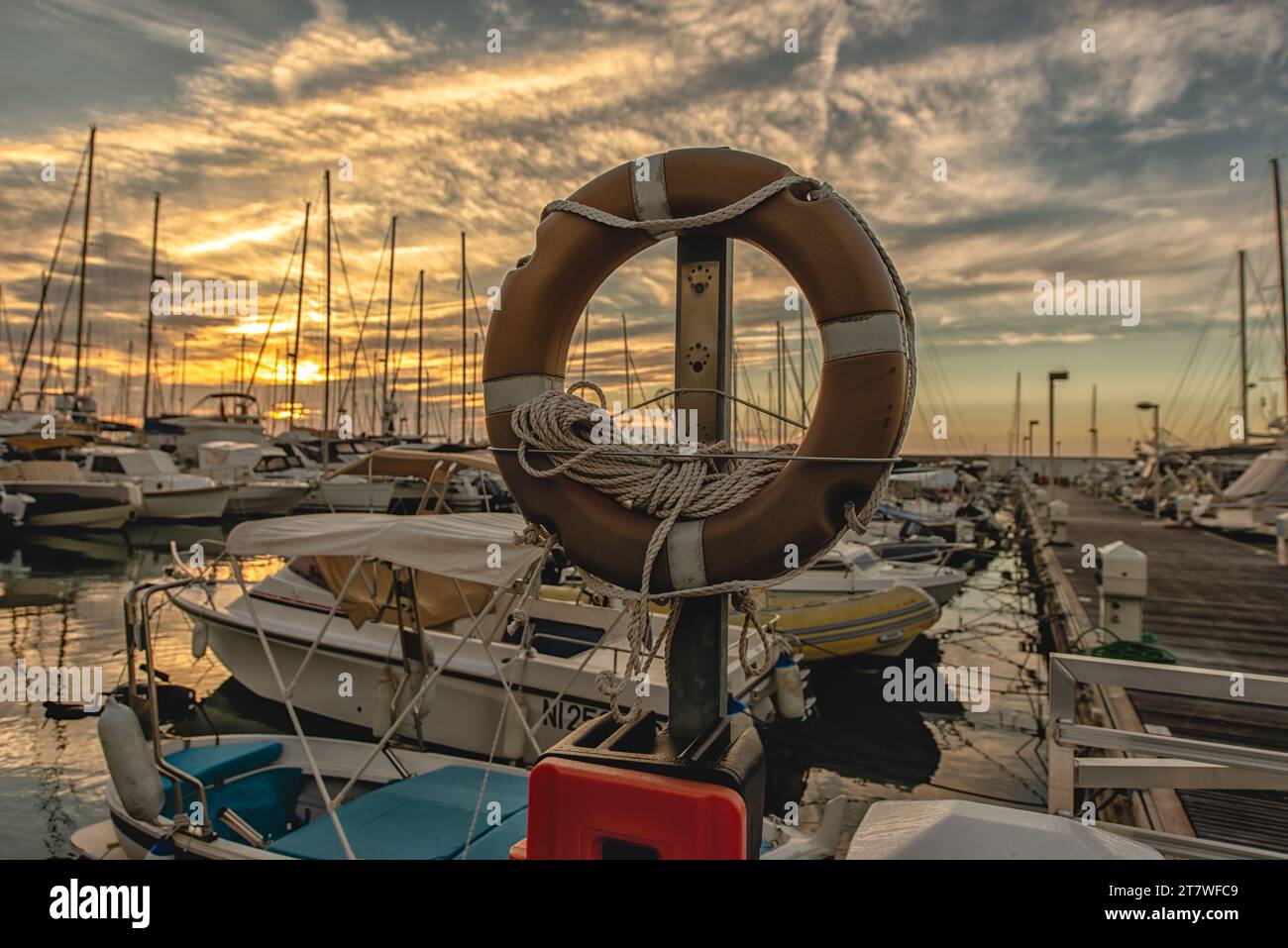 Yachts and boats in the harbour of Menton, in front of colorful ...