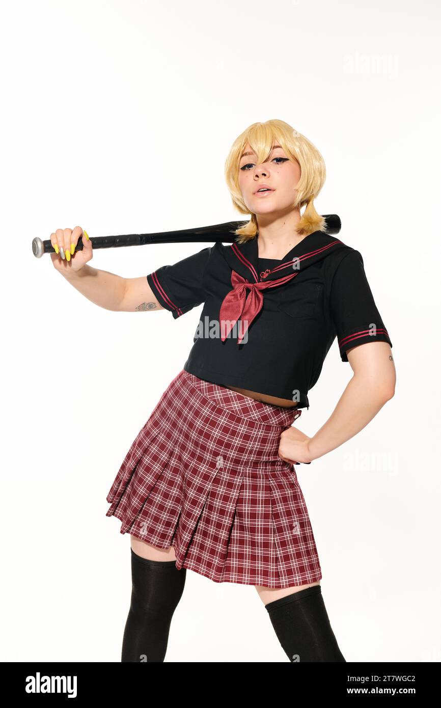 cosplay character, haughty woman in school uniform with baseball bat ...