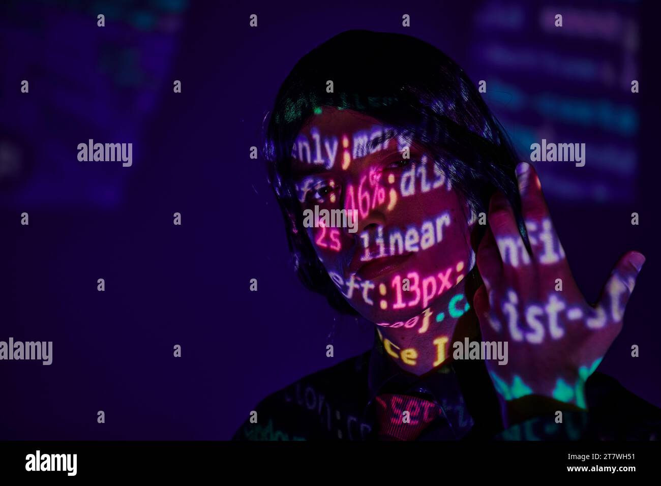anime style student in black wig in neon light with programming symbols ...