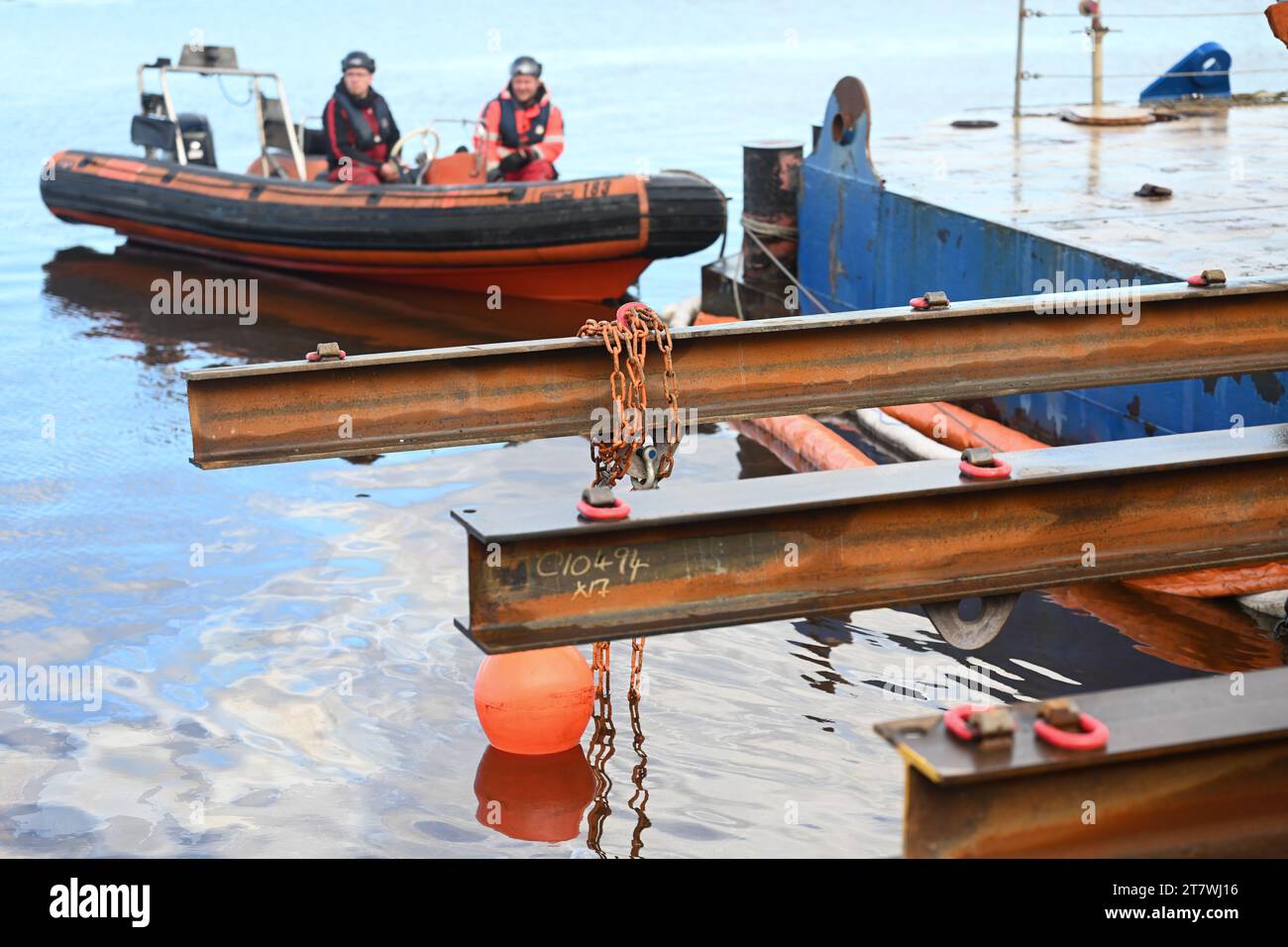 Emden, Germany. 17th Nov, 2023. Employees of the salvage company ...