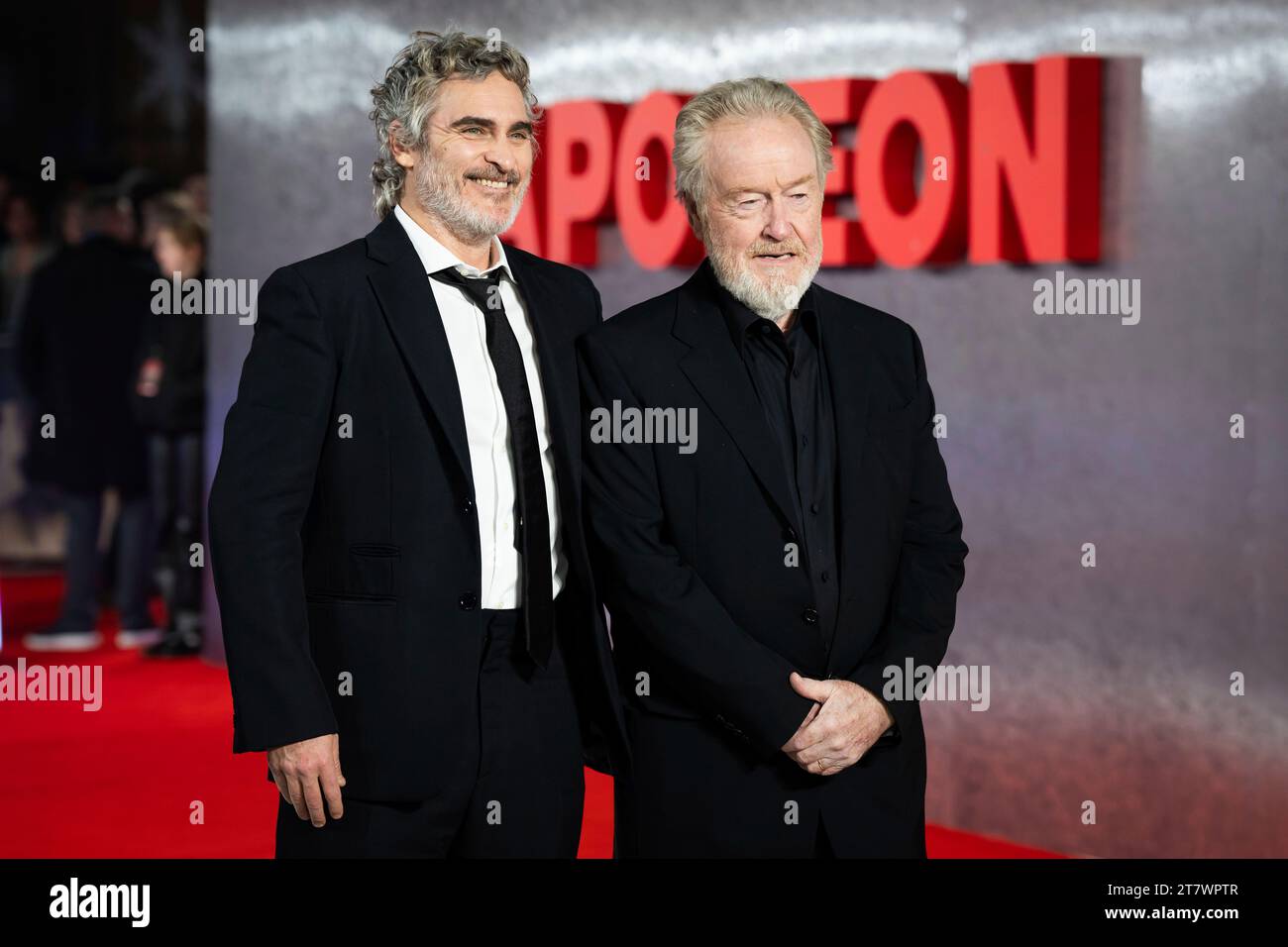 Joaquin Phoenix, left, and Ridley Scott pose for photographers upon ...