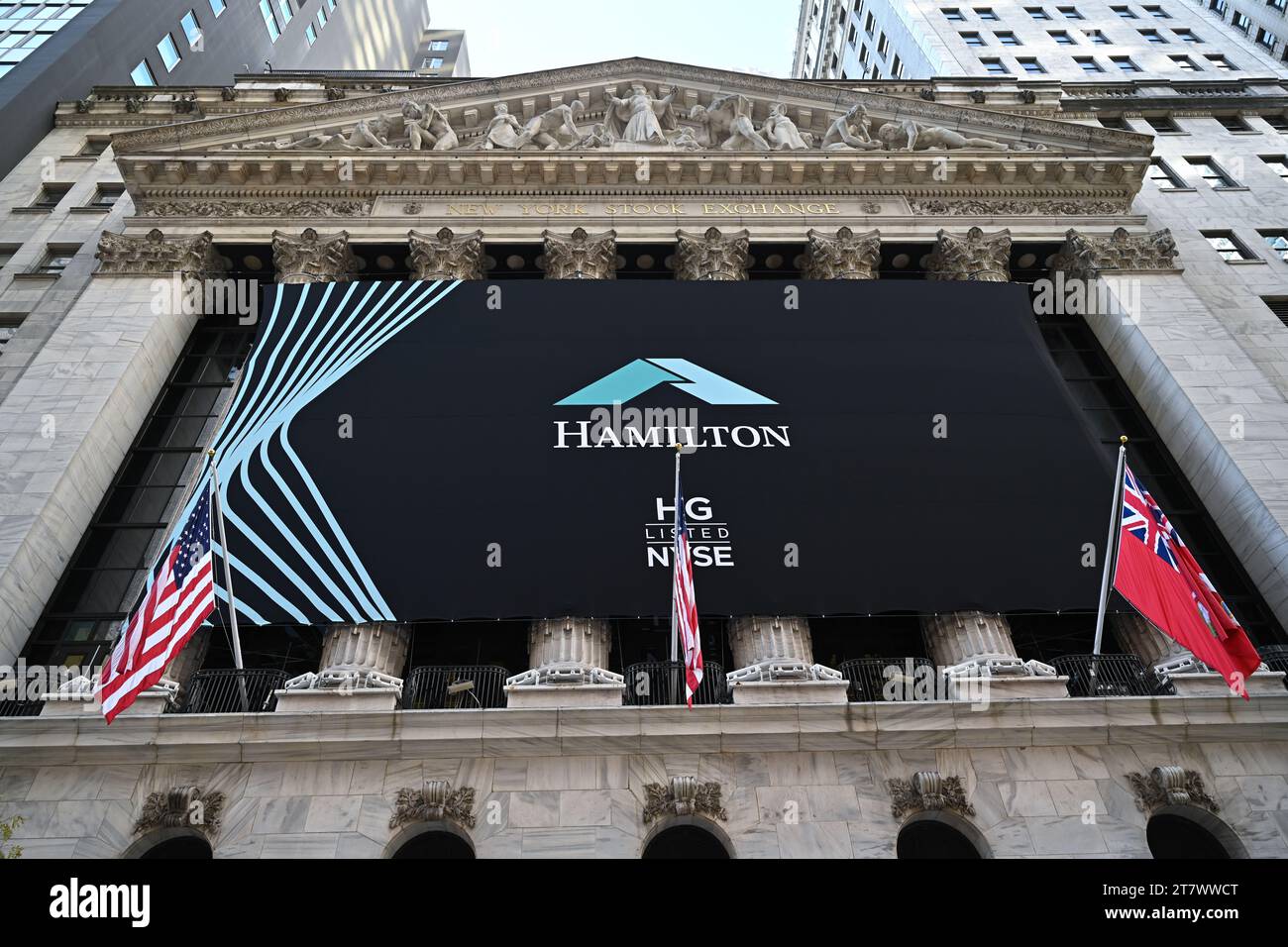 Signage for Hamilton (HG) outside the New York Stock Exchange (NYSE) on ...