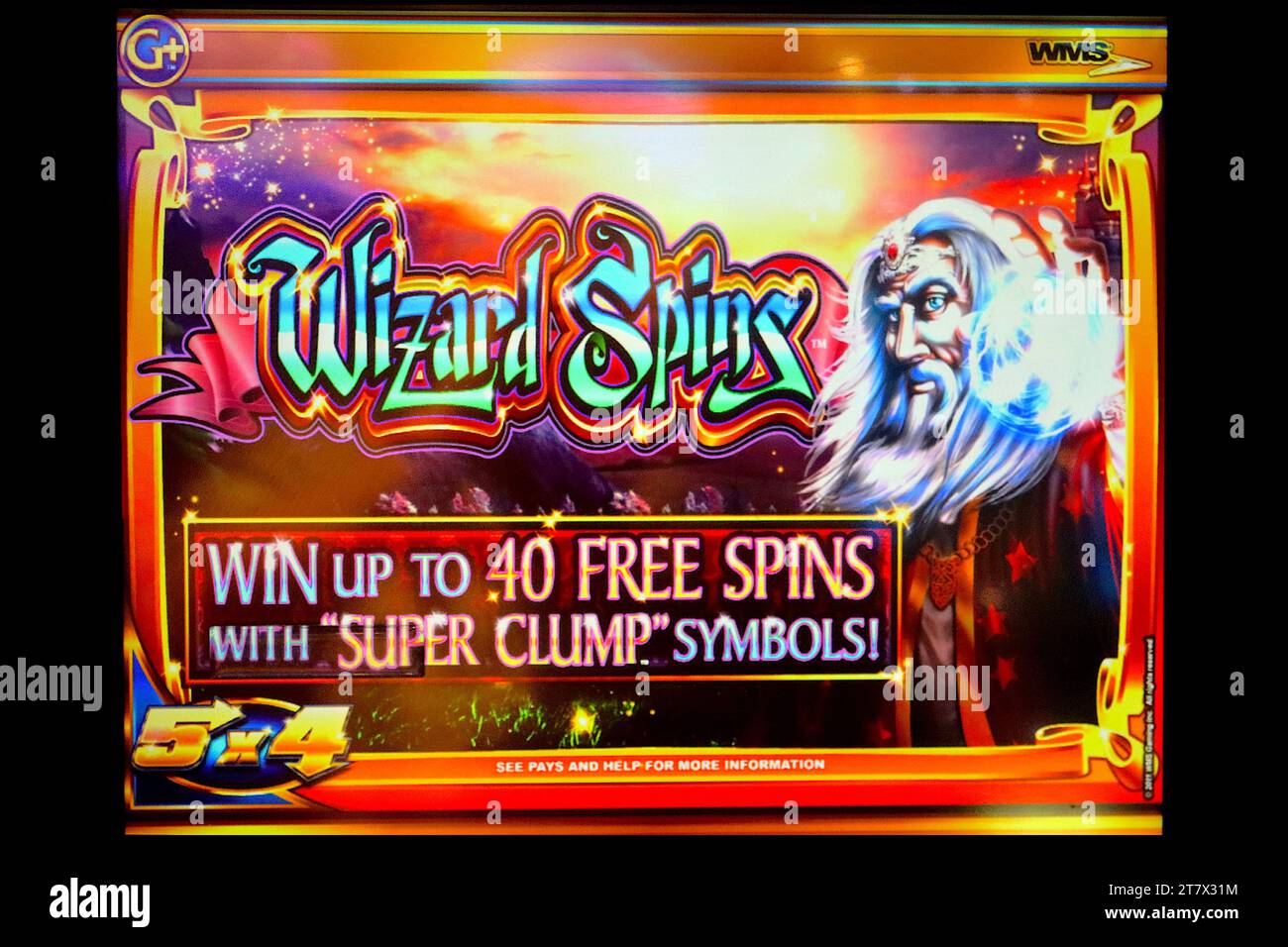 Illuminated header panel mounted on a Wizard Spins video slots arcade ...