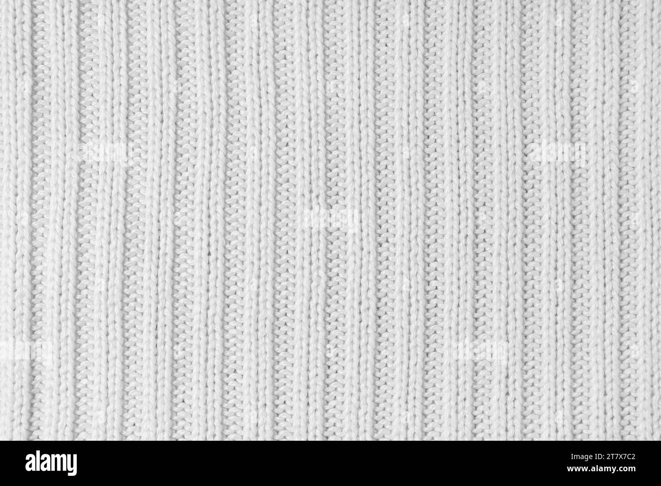 Jersey textile background , white striped knitted fabric. Woolen ...