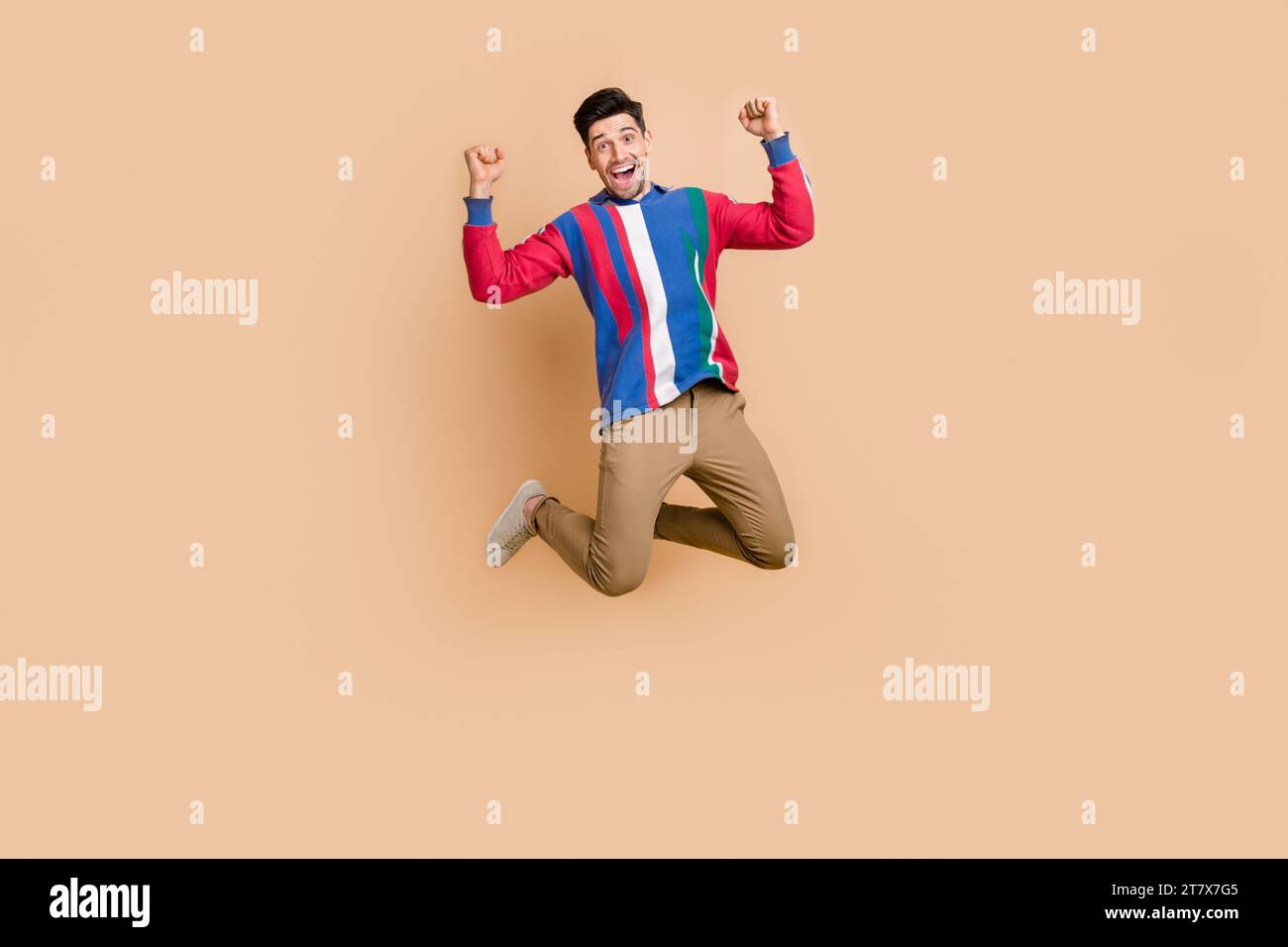Full length body photo of jumping trampoline funky sportive businessman ...
