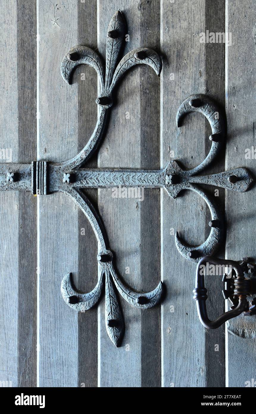 ornate forged church door hinge Stock Photo - Alamy