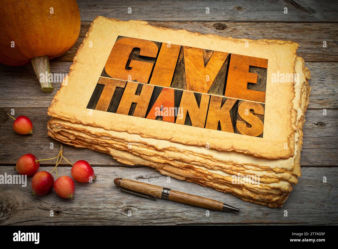Give thanks word abstract in letterpress wood type on retro art paper ...