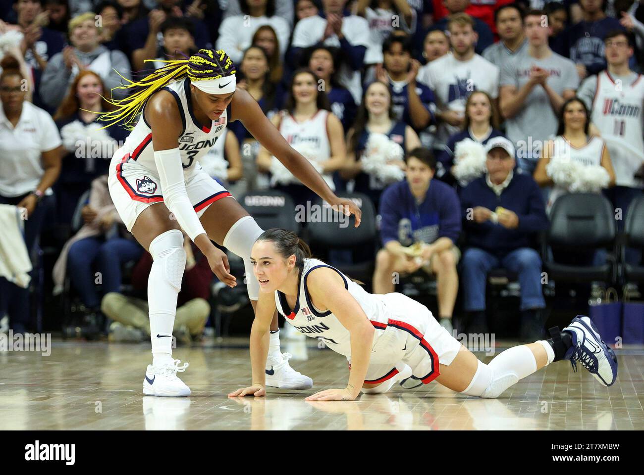 STORRS, CT - NOVEMBER 16: UConn Huskies forward Aaliyah Edwards (3) assist UConn Huskies guard ...