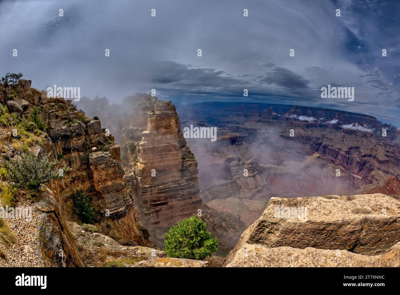 Grand Canyon view from Moran Point on a cloudy day with the clouds floating inside the canyon ...
