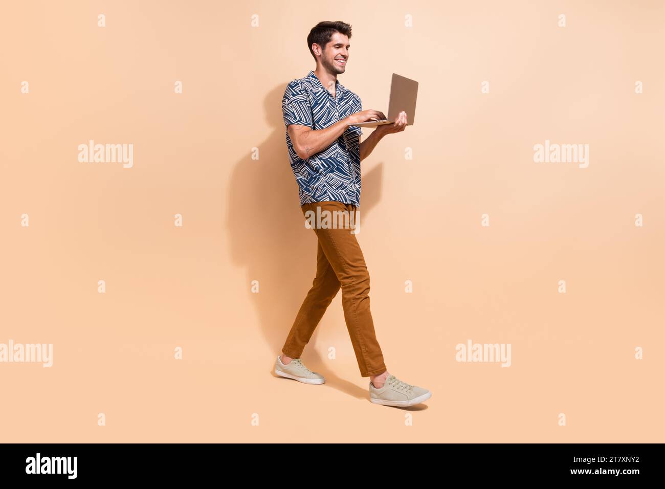 Full body length photo of happy young guy professional programming code ...