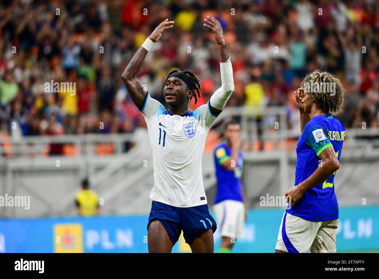 Jakarta, Indonesia. 17th Nov, 2023. Joel Ndala (L) of England ...