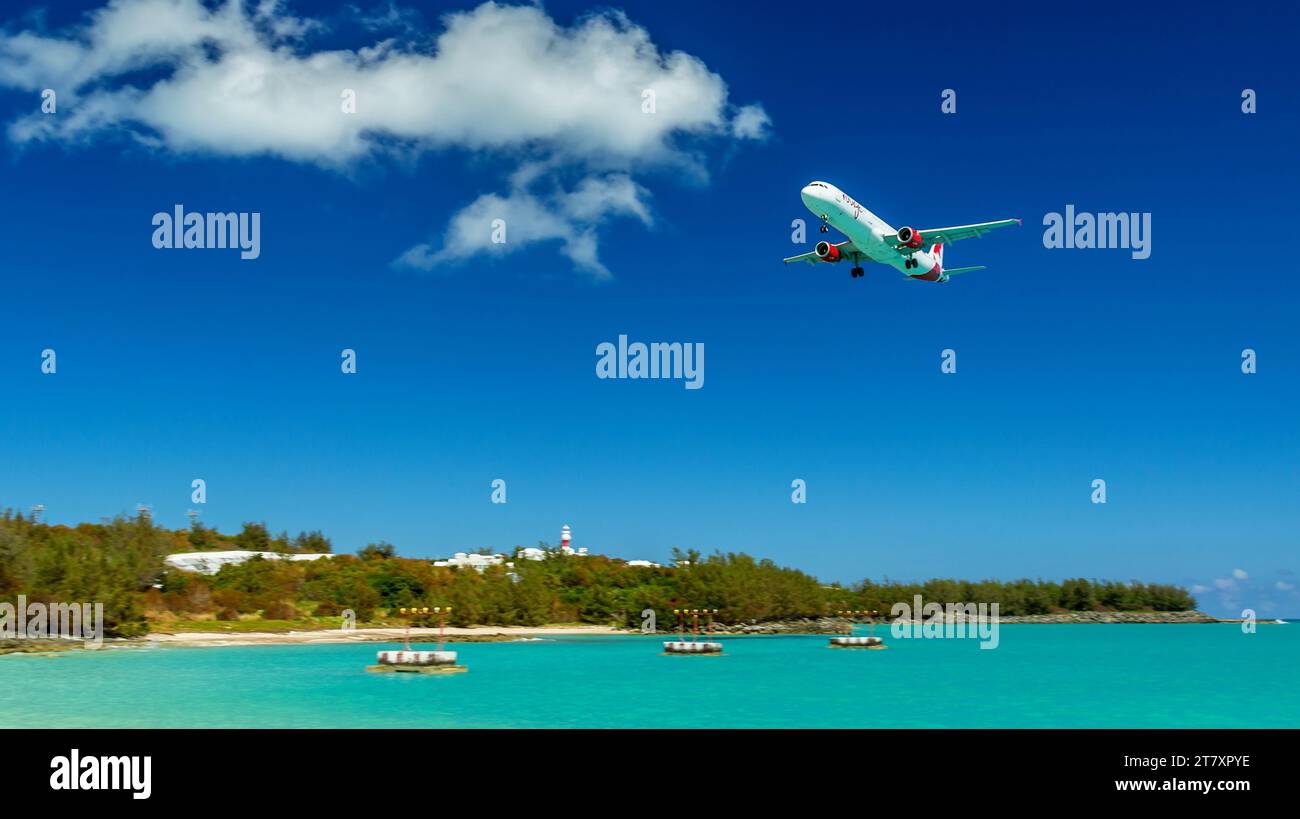 Bermuda beach with landing airplane hi-res stock photography and images ...