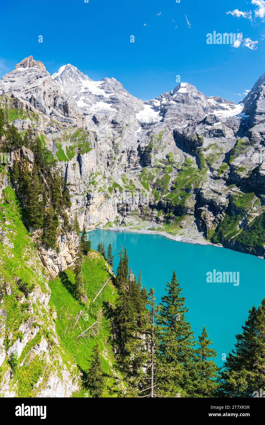 Elevated view of the crystal blue water of the lake of Oeschinensee ...