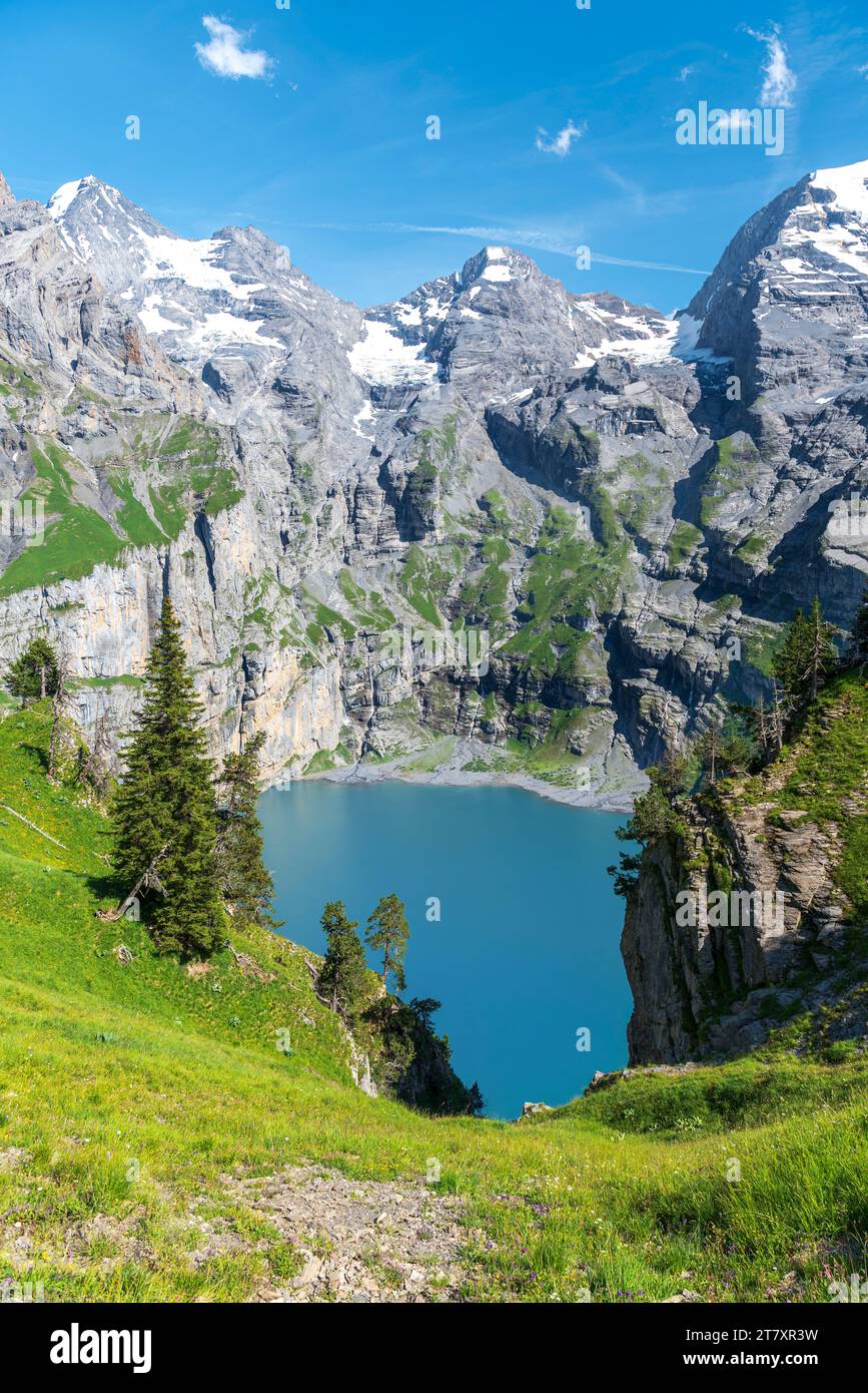Elevated view of the crystal clear water of Oeschinensee lake ...